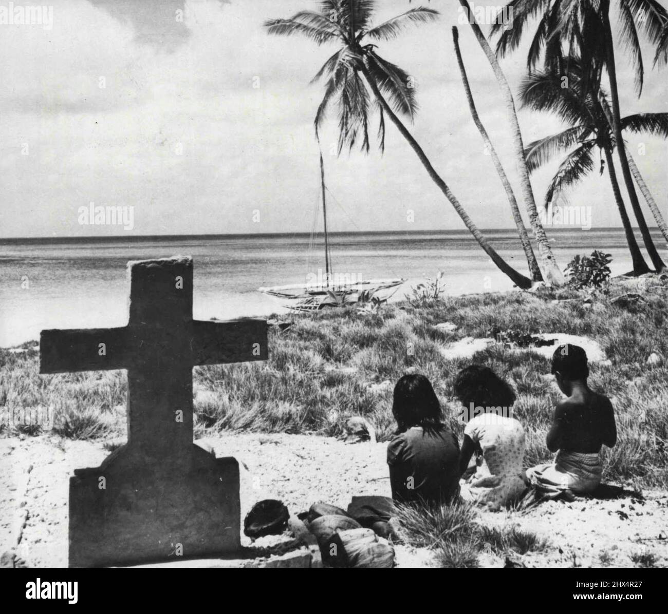 Their Final Visit To Bikini Cemetery -- Three Natives pay their last ...