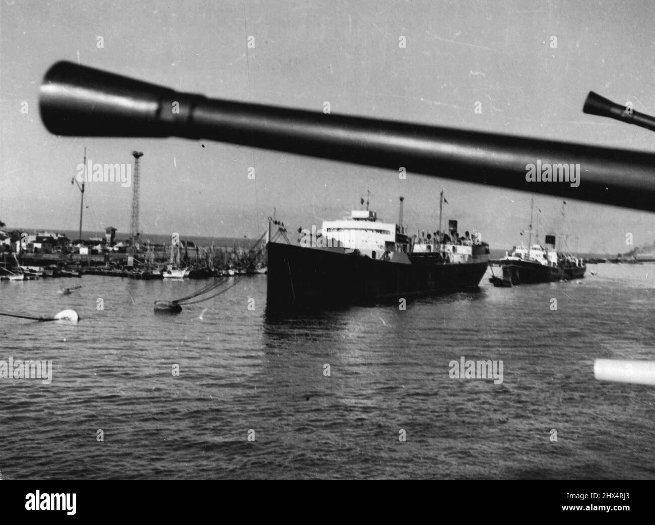 Merchant shipping gin Port Said Harbour, where they been berthed by R.N ...