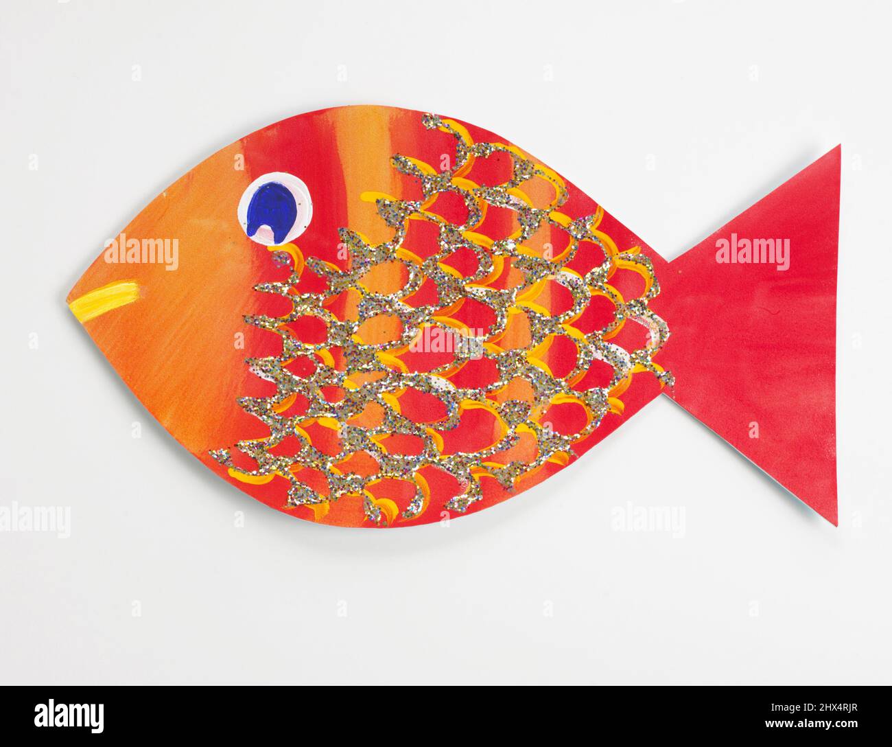 Homemade paper fish with painted glittery scales, close-up Stock Photo ...