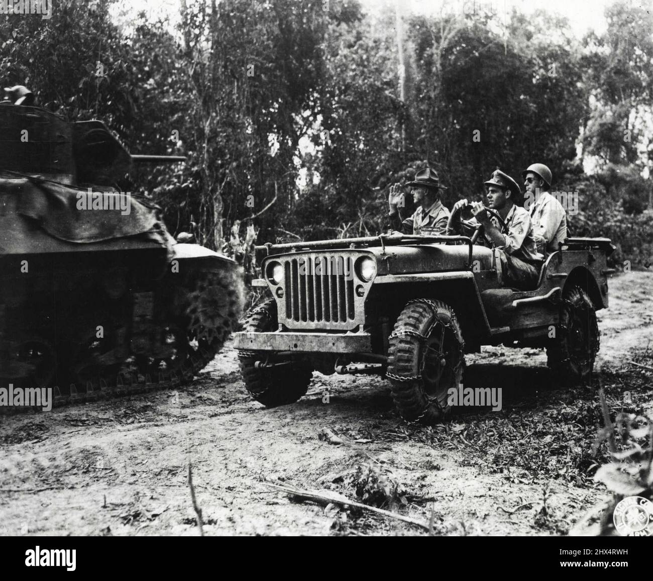 Lt. Gen. Joseph W. Stilwell returns a salute from a Chinese tank driver ...