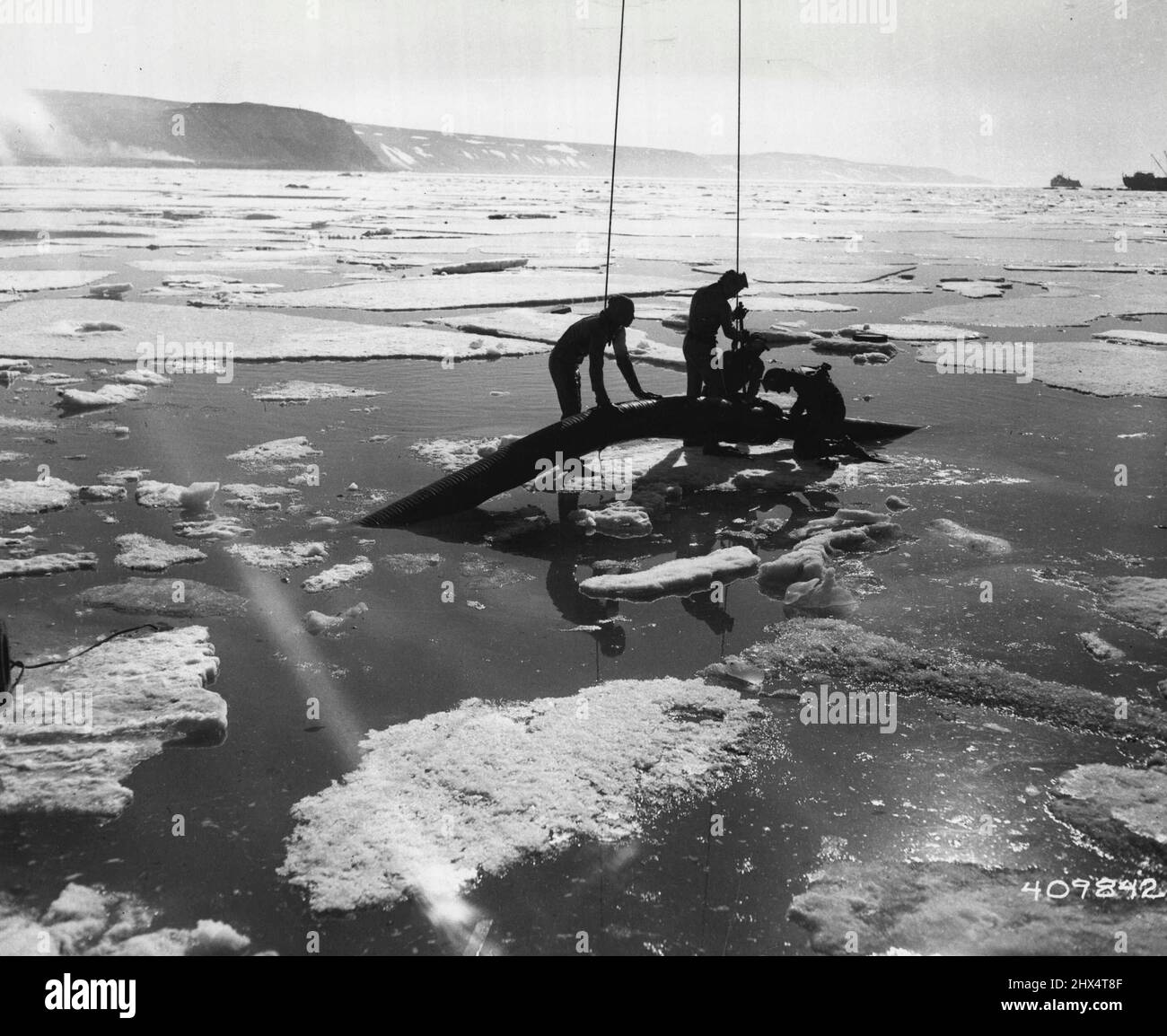 Project "Blue-Jay" -- Frogmen replacing gasket on underwater POL line ...