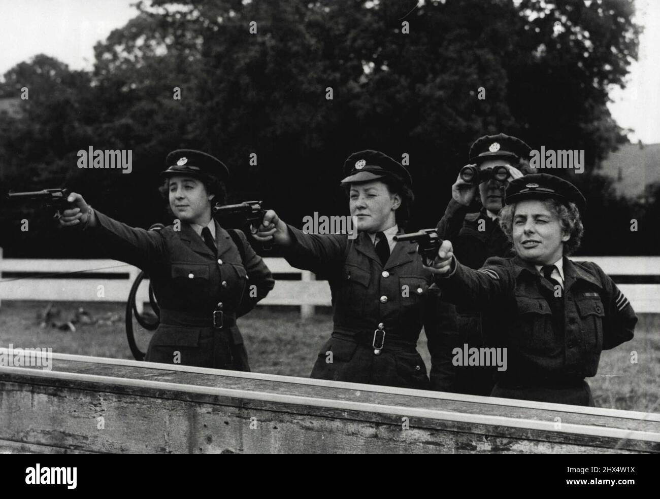 "Pistol-Packing" Wrafs - Three of the competitors in the pistol shoot ...
