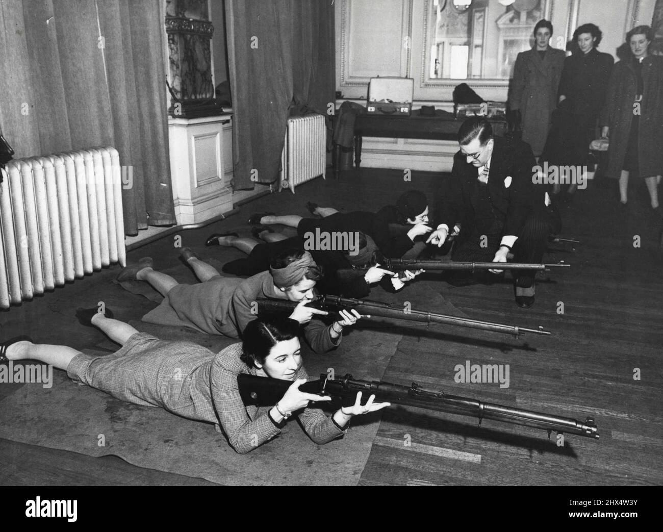 Teaching The Women How To Handle A Rifle. - Mr. A.W. Arkell the well ...