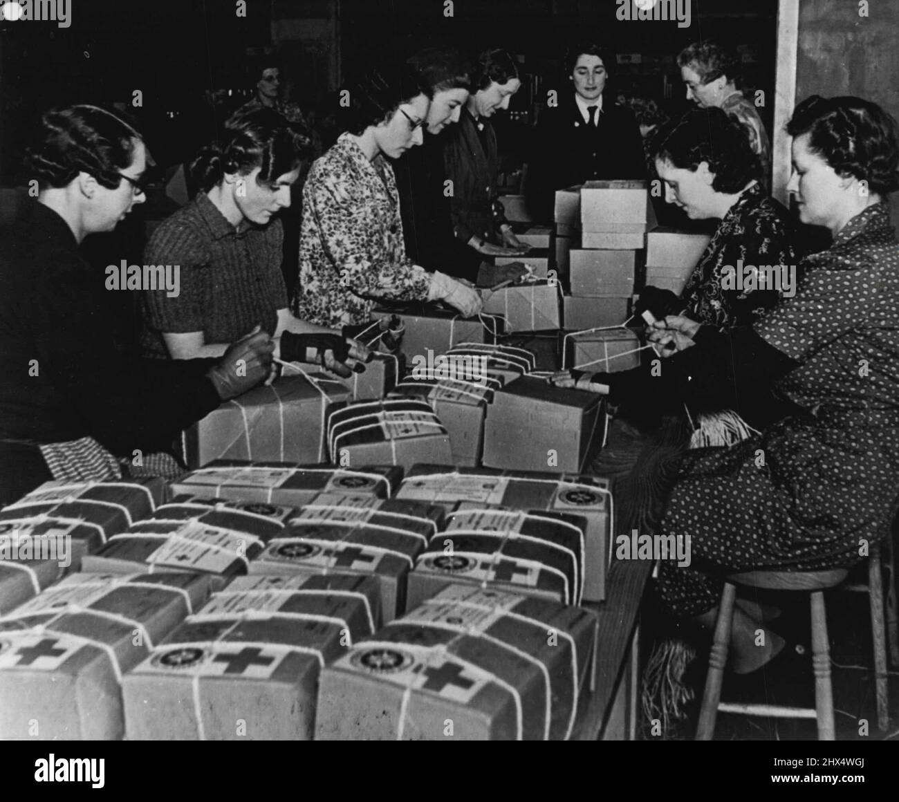 Packing parcels for prisoners of war. October 16, 1943 Stock Photo - Alamy
