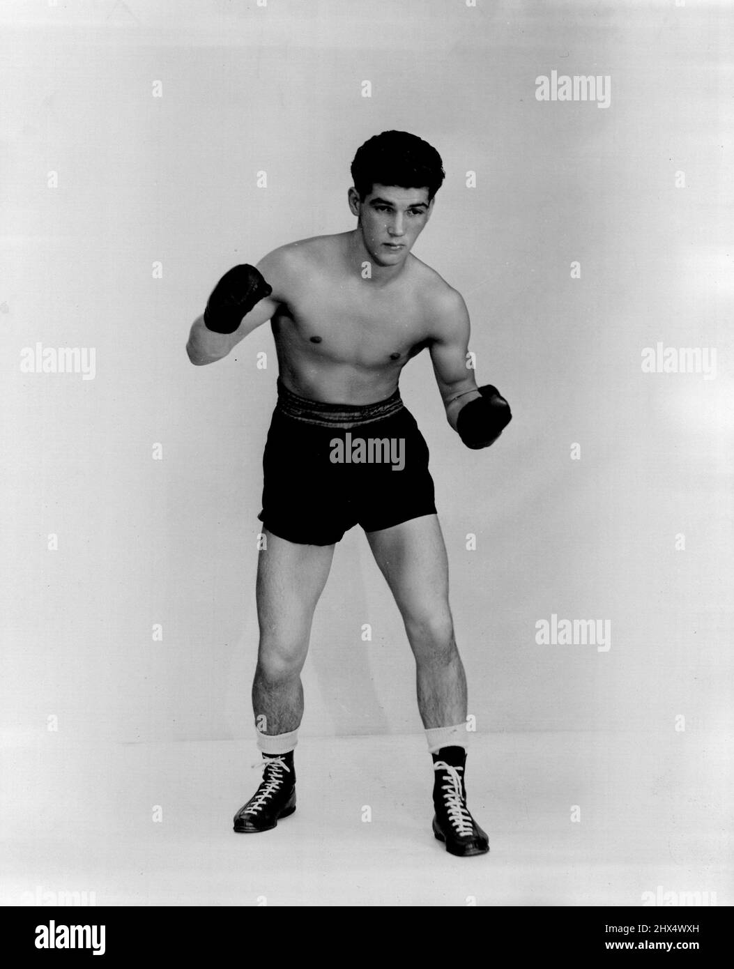 Charlie Dunn who meets Pat Ford at the Stadium Monday night. June 26 ...