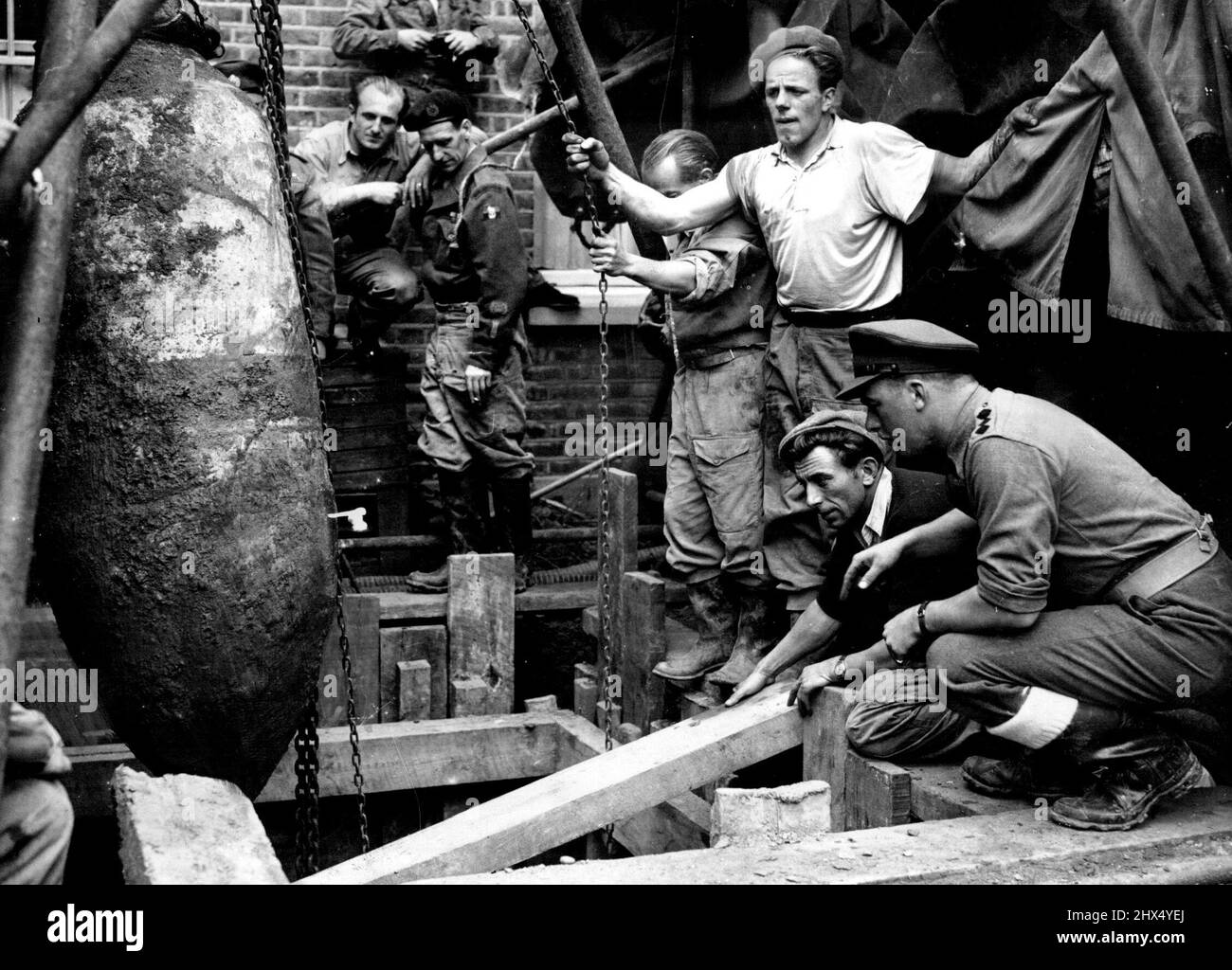 Here is the bomb coming up out of the ground in Mr. Mansell's back ...