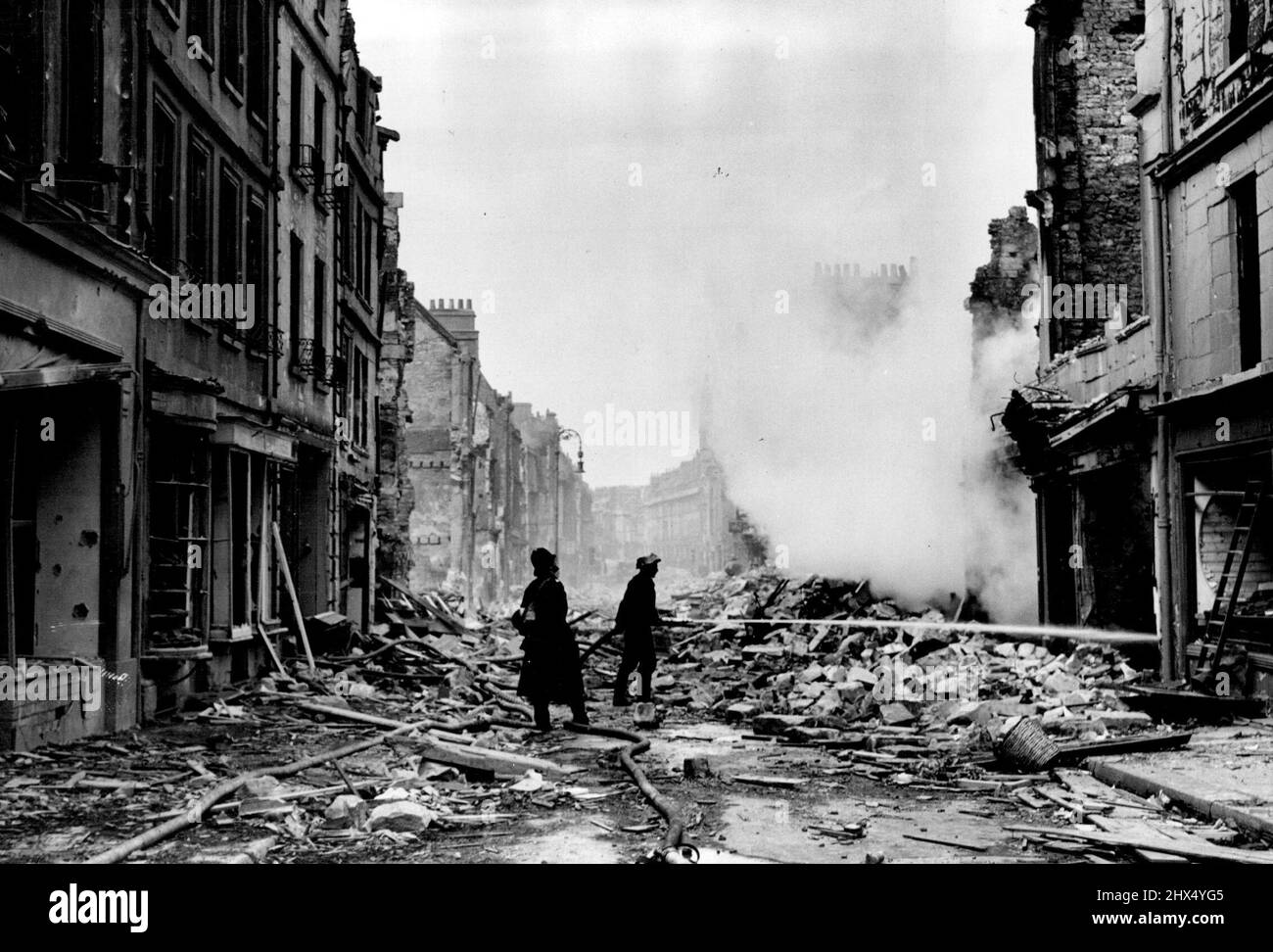 Bombing of Bath A fireman still at his job of fighting the fire in one ...