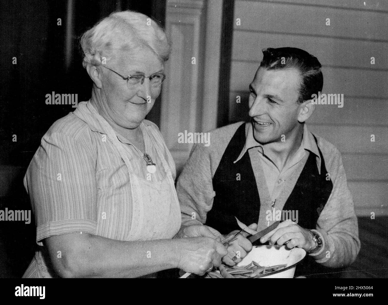 Les Stock, hot favorite for this afternoon's Stawell Gift, helps Mrs. J ...