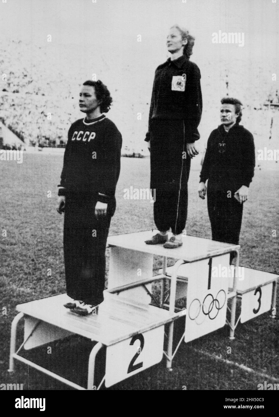 80-Metre Winners -- Pictured here on the winners' podium in Helsinki's ...