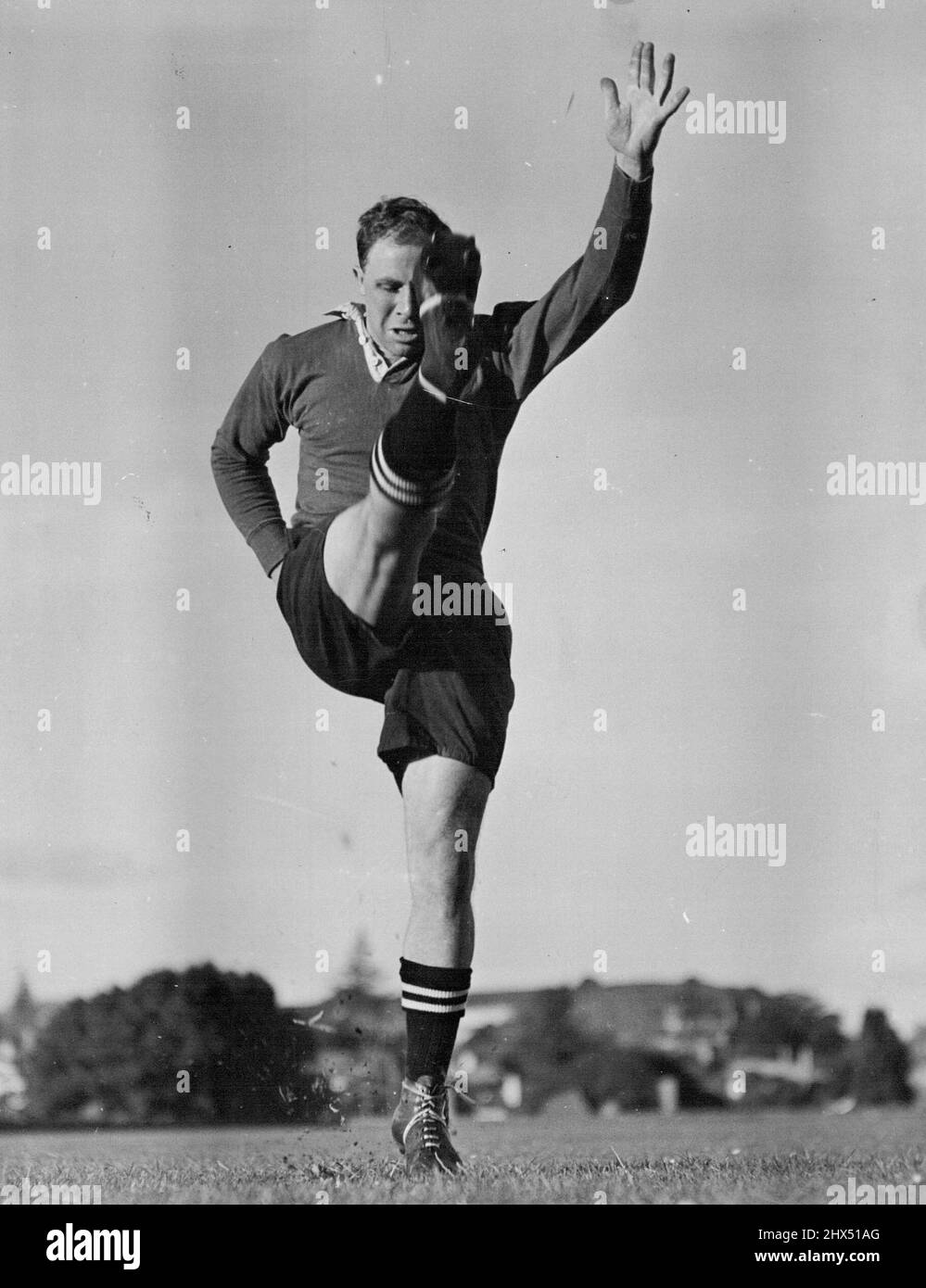 This is the third of a series of six photograph showing Bob's action as ...