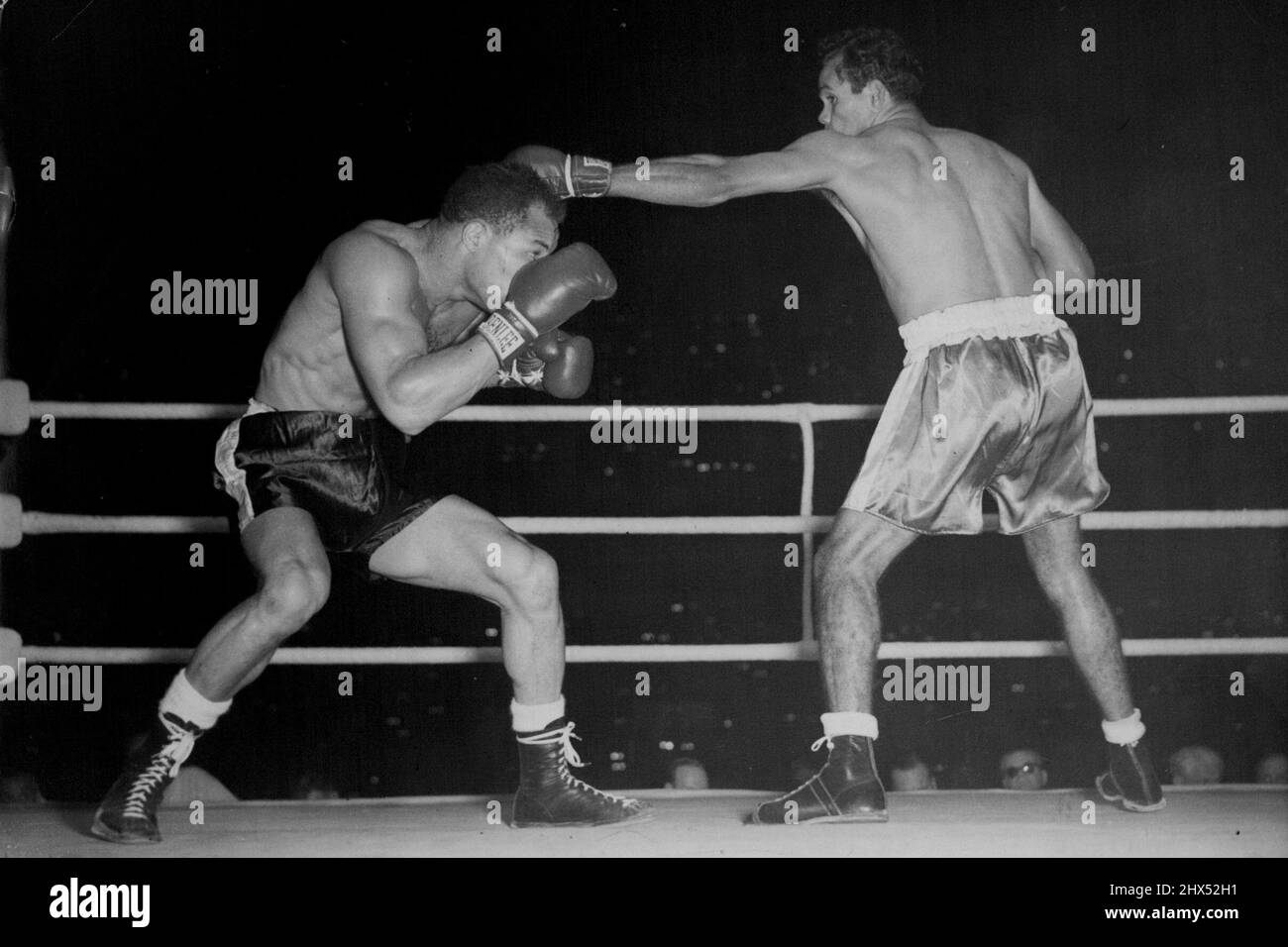 Dave Sands Beats American -- Australia's Dave Sands (right) throws a ...