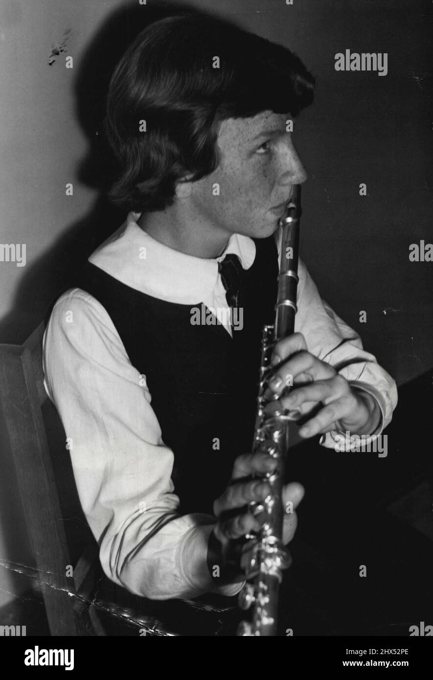 Jan Maclean, (14), flautist of 6 months standing, believes it's easy ...