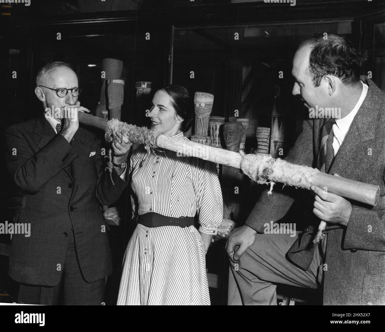 Professor Elkin shows Beth Dean and her husband how to play ...