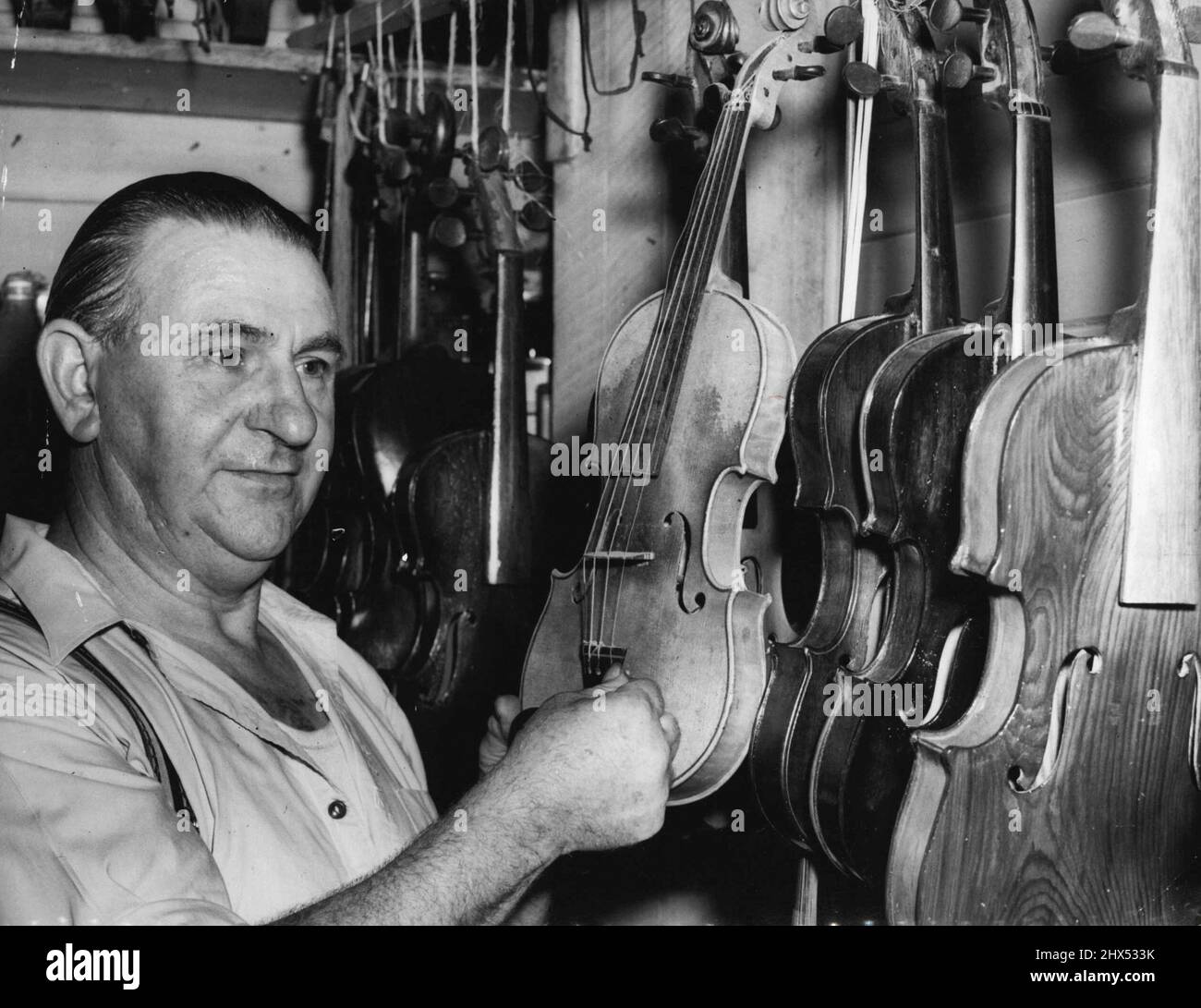 Misc. - Music - Instruments - Violins. January 31, 1952 Stock Photo - Alamy