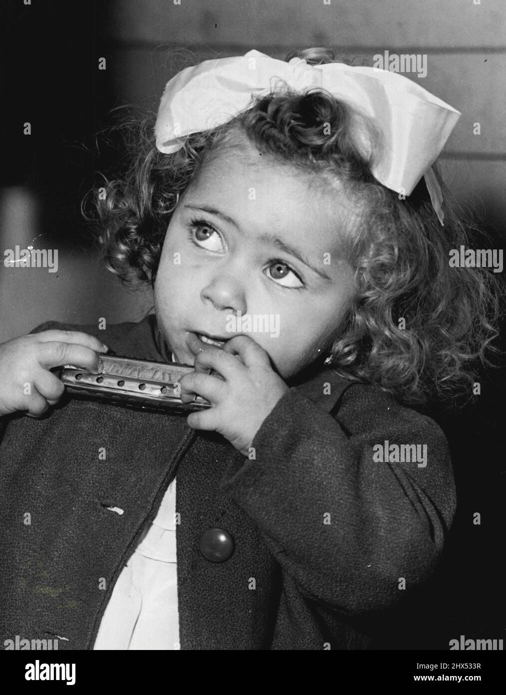Harmonica child hi-res stock photography and images - Alamy