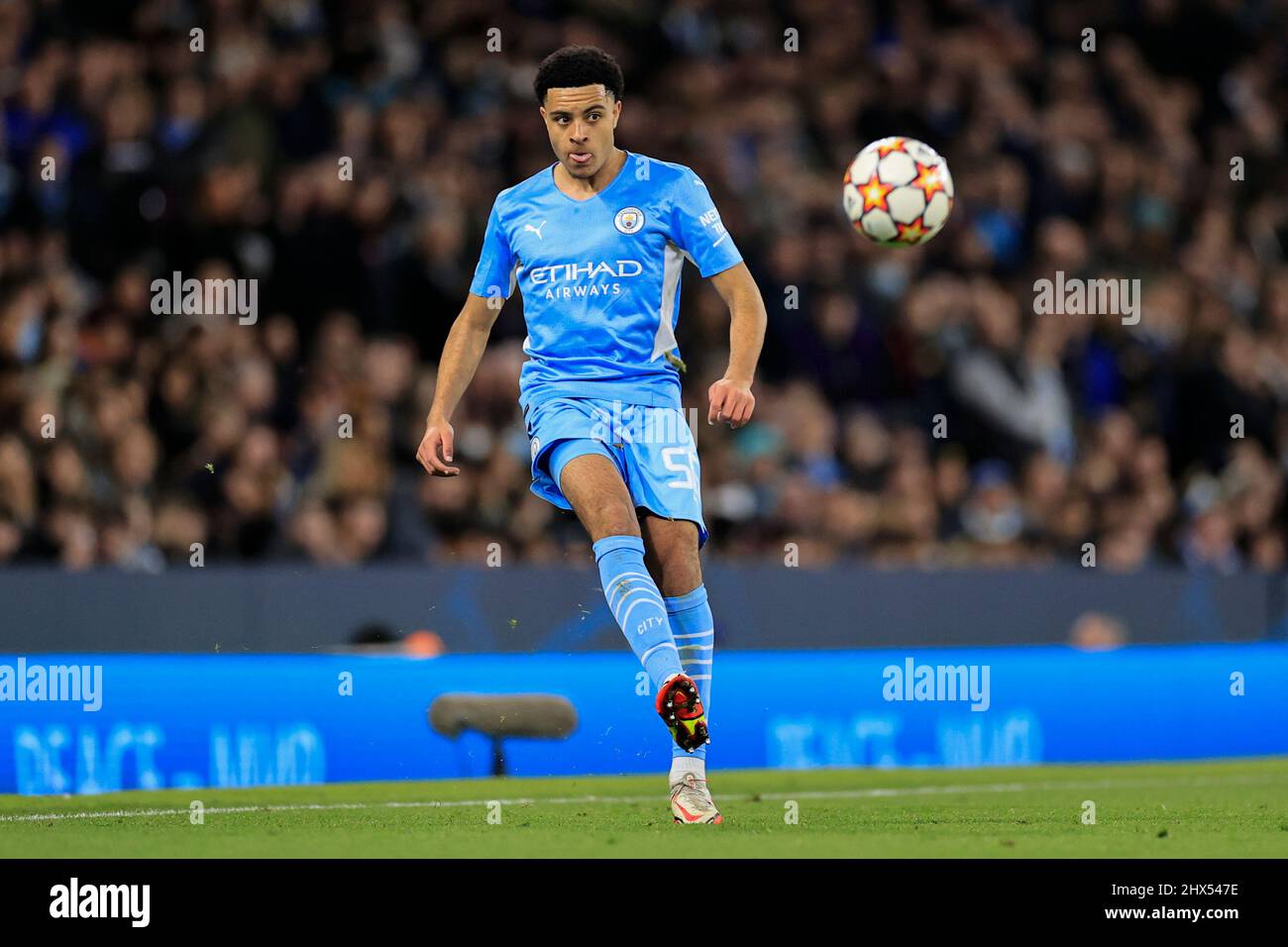 Conrad Egan-Riley #56 of Manchester City crosses the ball Stock Photo ...