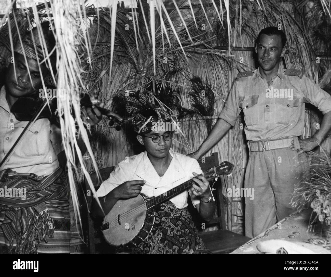 Lieutenant B.N. Jolly of Franklin, Tasmania, listens to the Rajah of ...