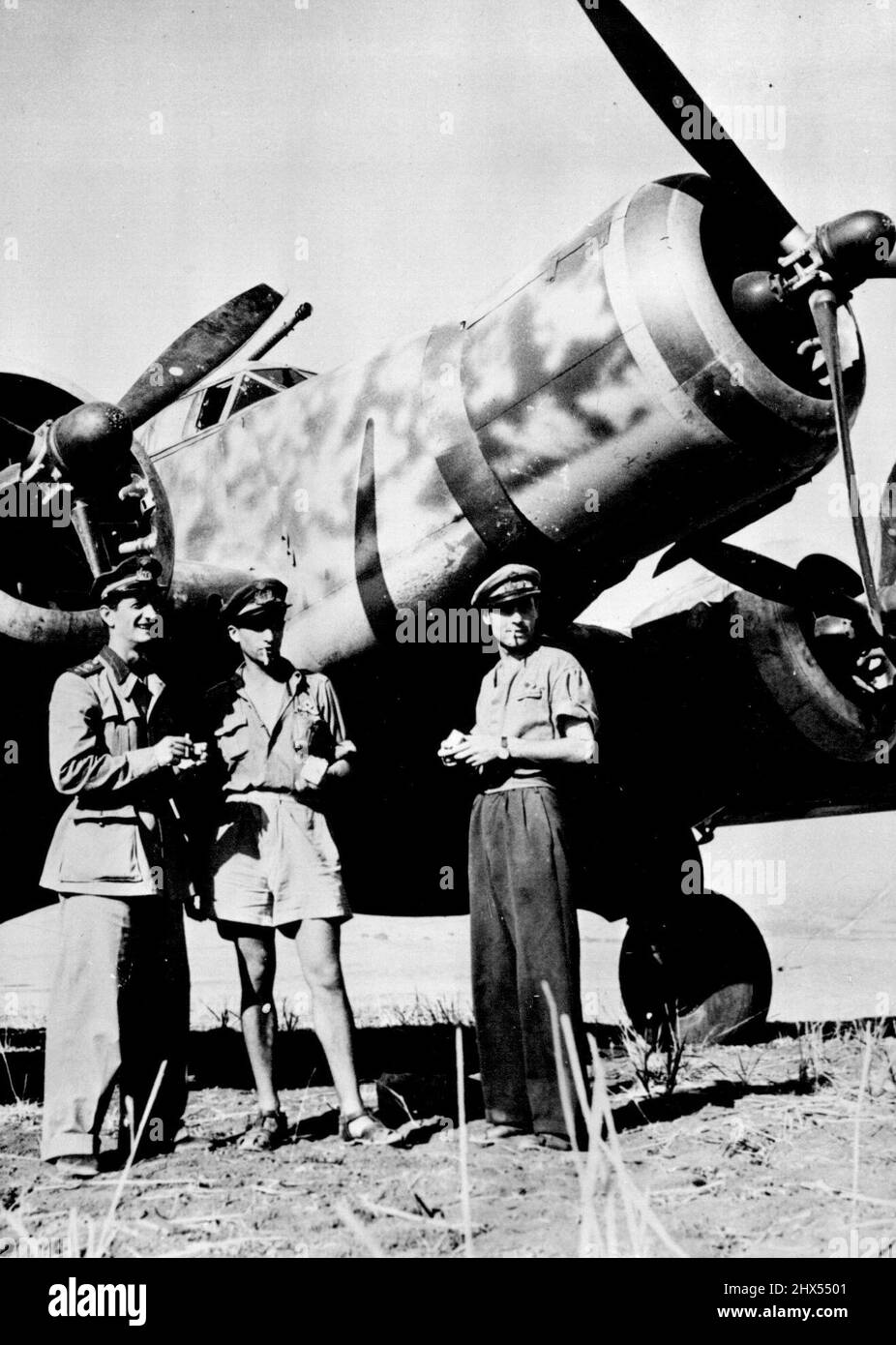 Italian Pilots At Allied Base. Italian pilots stand in front of one of ...