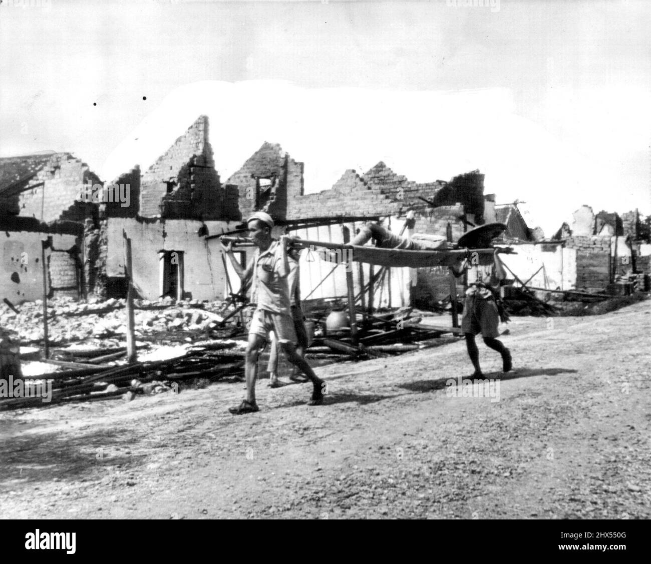 Casuality In China's Battle -- Stretcher bearers carry a wounded ...