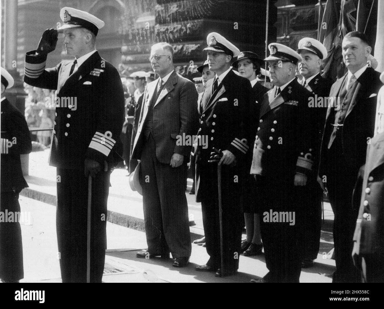 At the saluting force navy march for loan Admiral Sir Guy Royle taking ...