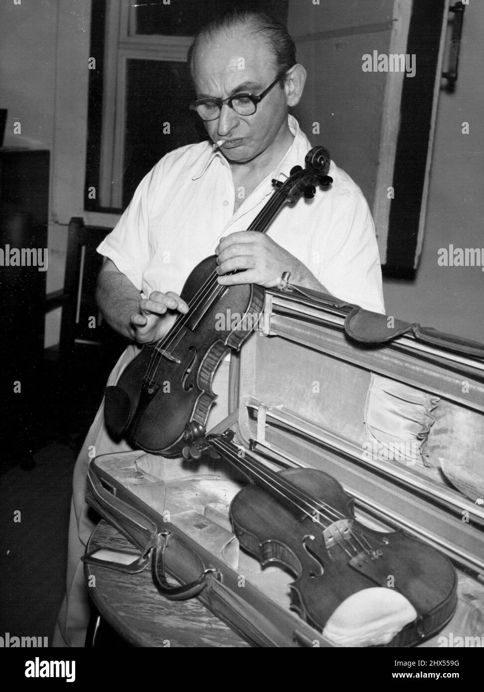 Worth £18,000, two rare violins have been brought to Brisbane by Mr ...