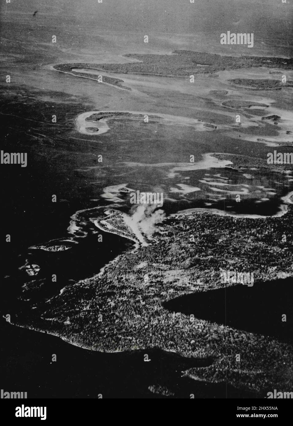 Japanese Base at Mund point Bombed This aerial view of Munda point ...