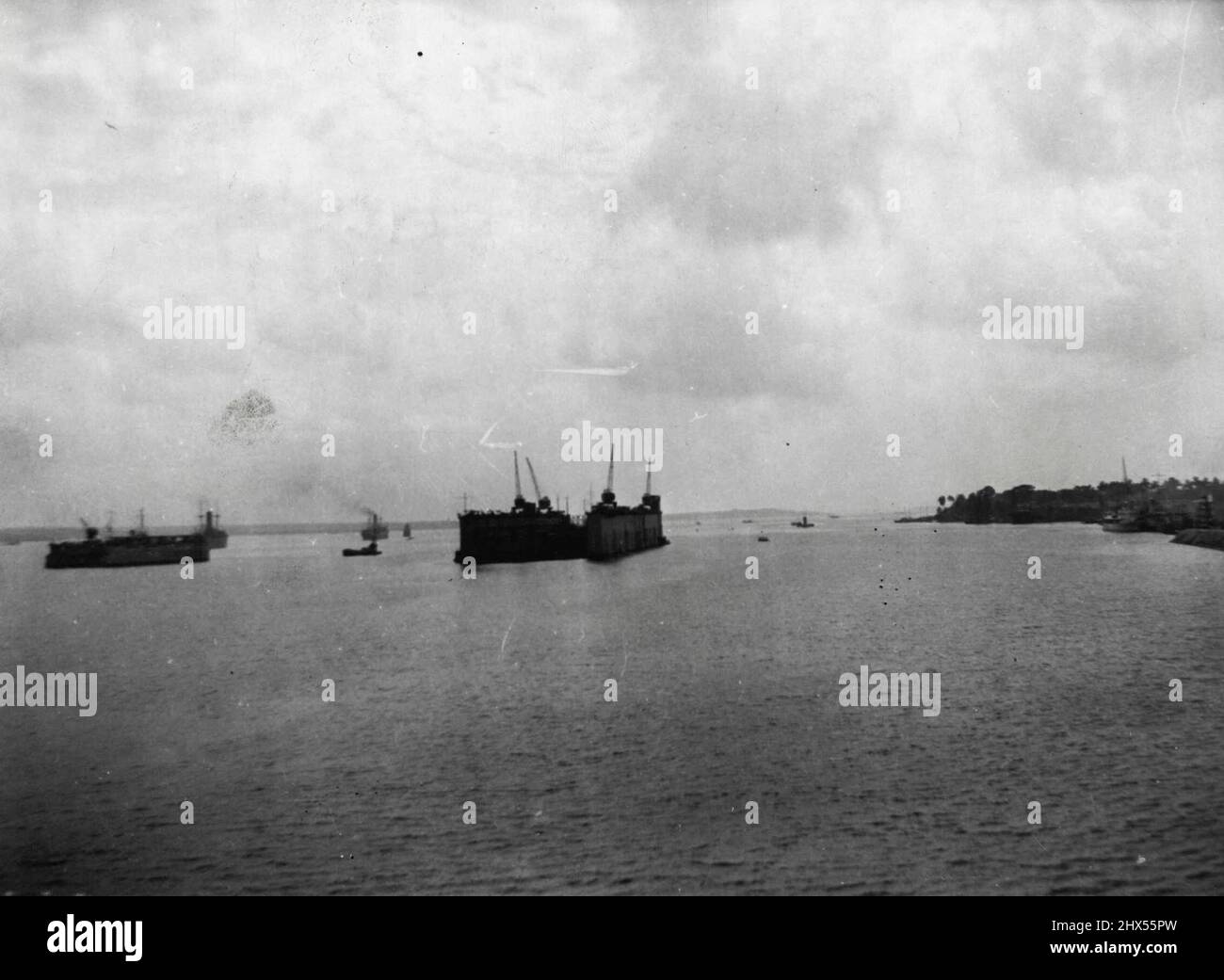 Floating dock Singapore naval base. Towed from England in sections, it ...