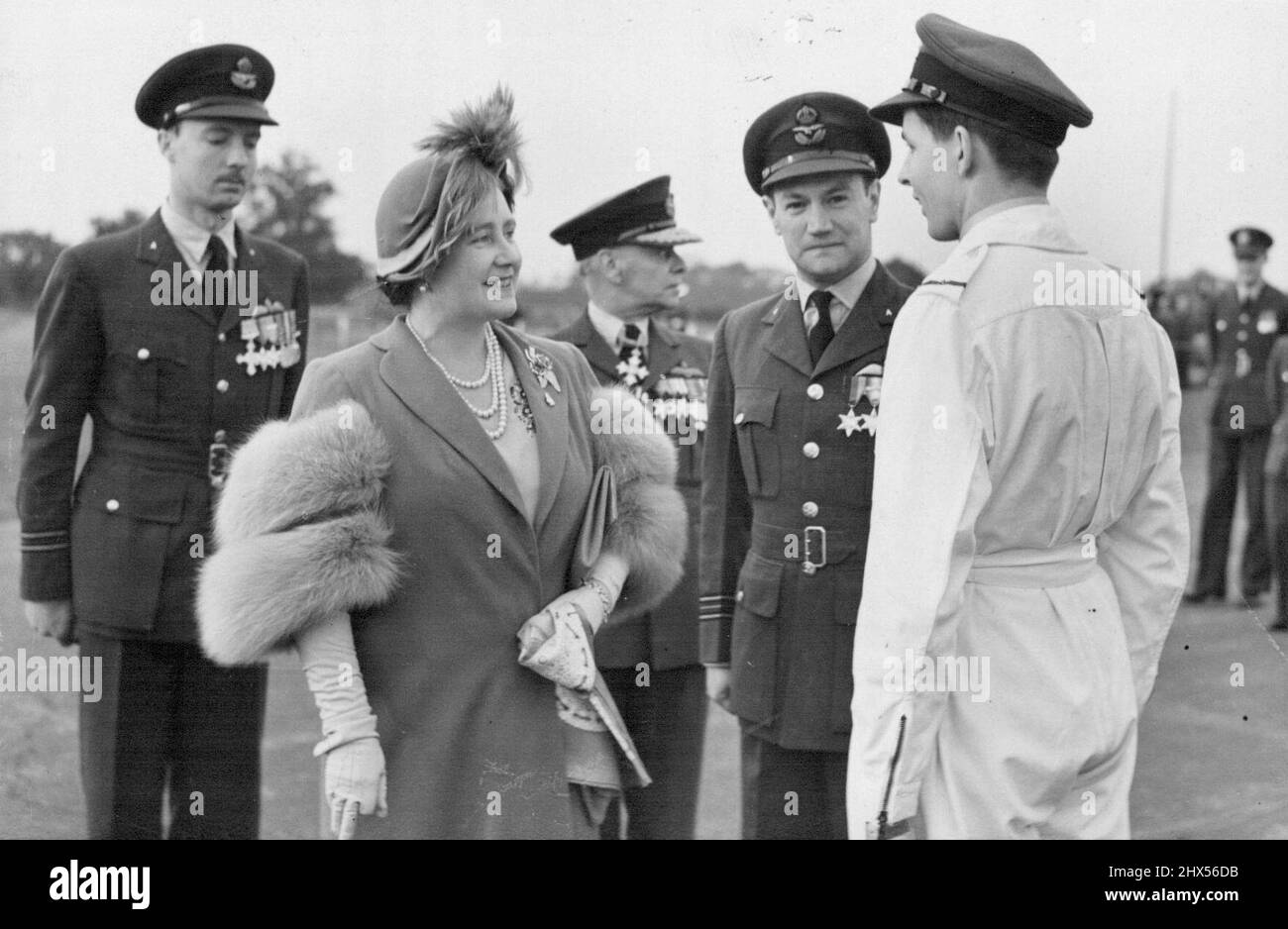H.M. The Queen Visits The R.A.A.F -- The Queen talking with P.O. John ...