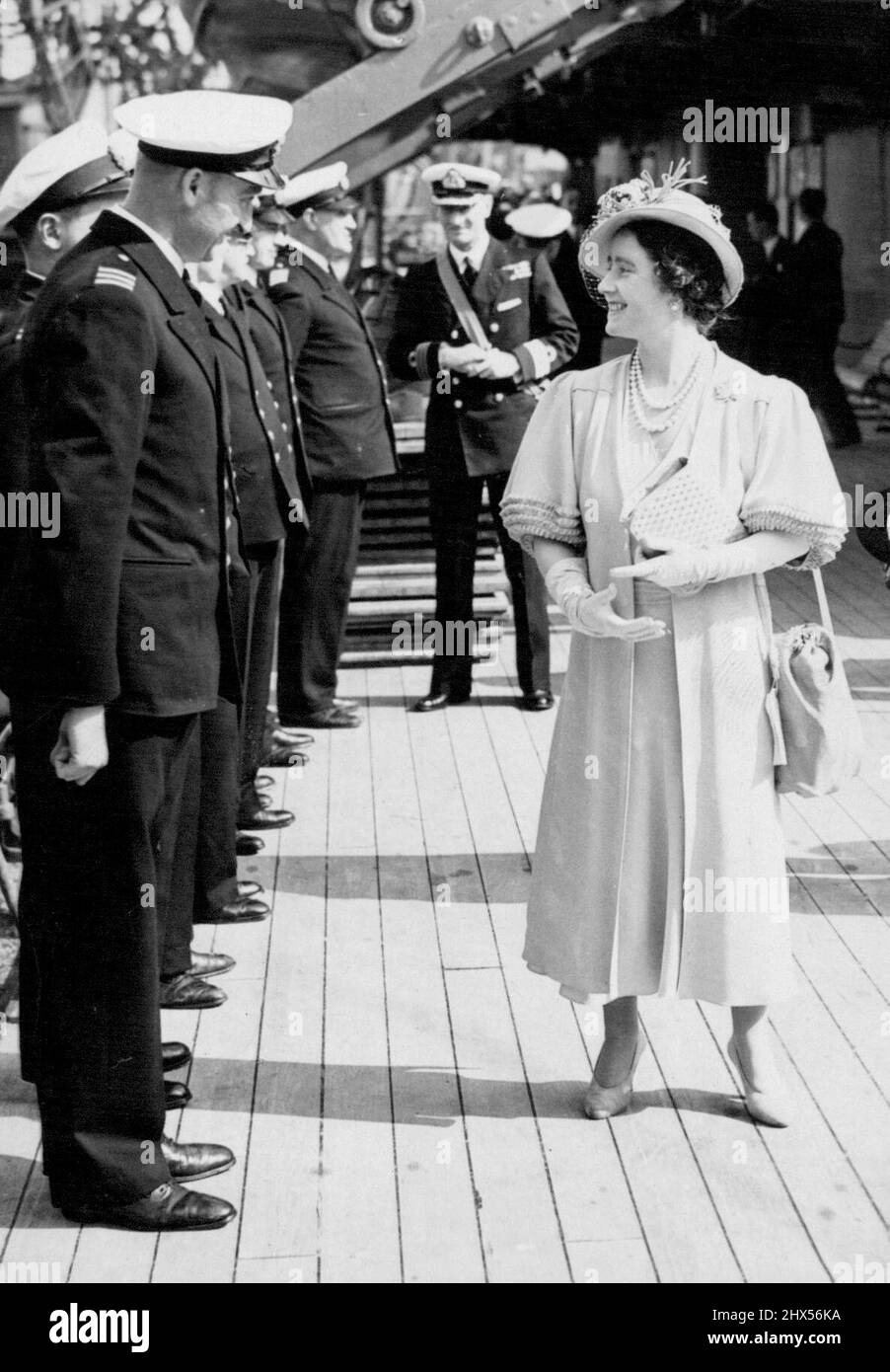 King And Queen Visit The Merchant Navy A happy snapshot of the Queen ...