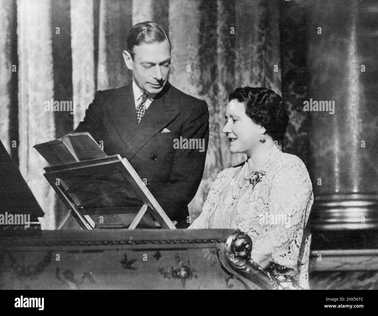 A charming study of the King and Queen in the blue drawing room on the ...