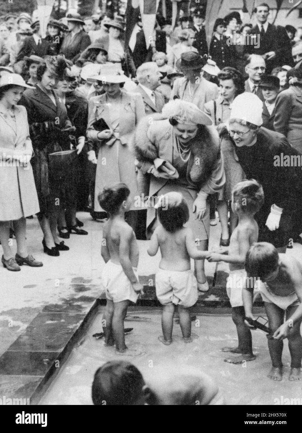 The Queen Inquires about the Wading - England's Queen Elizabeth talks ...