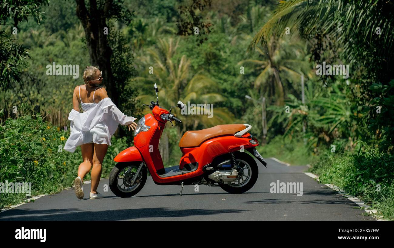 Girl on scooter accident hi-res stock photography and images - Alamy
