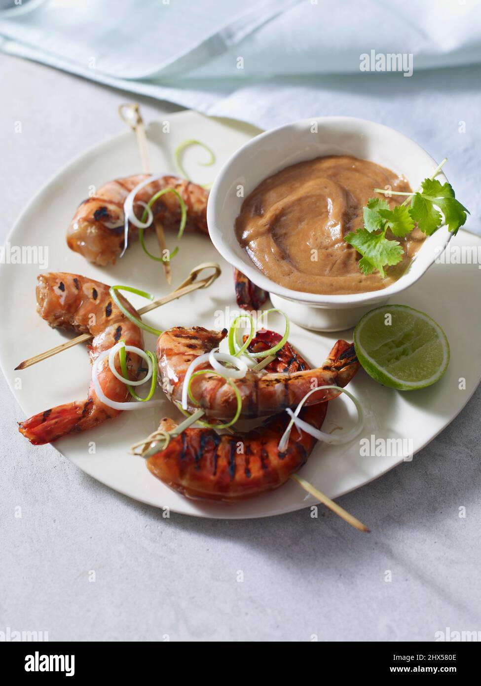 Barbecued prawn with peanut sauce Stock Photo - Alamy