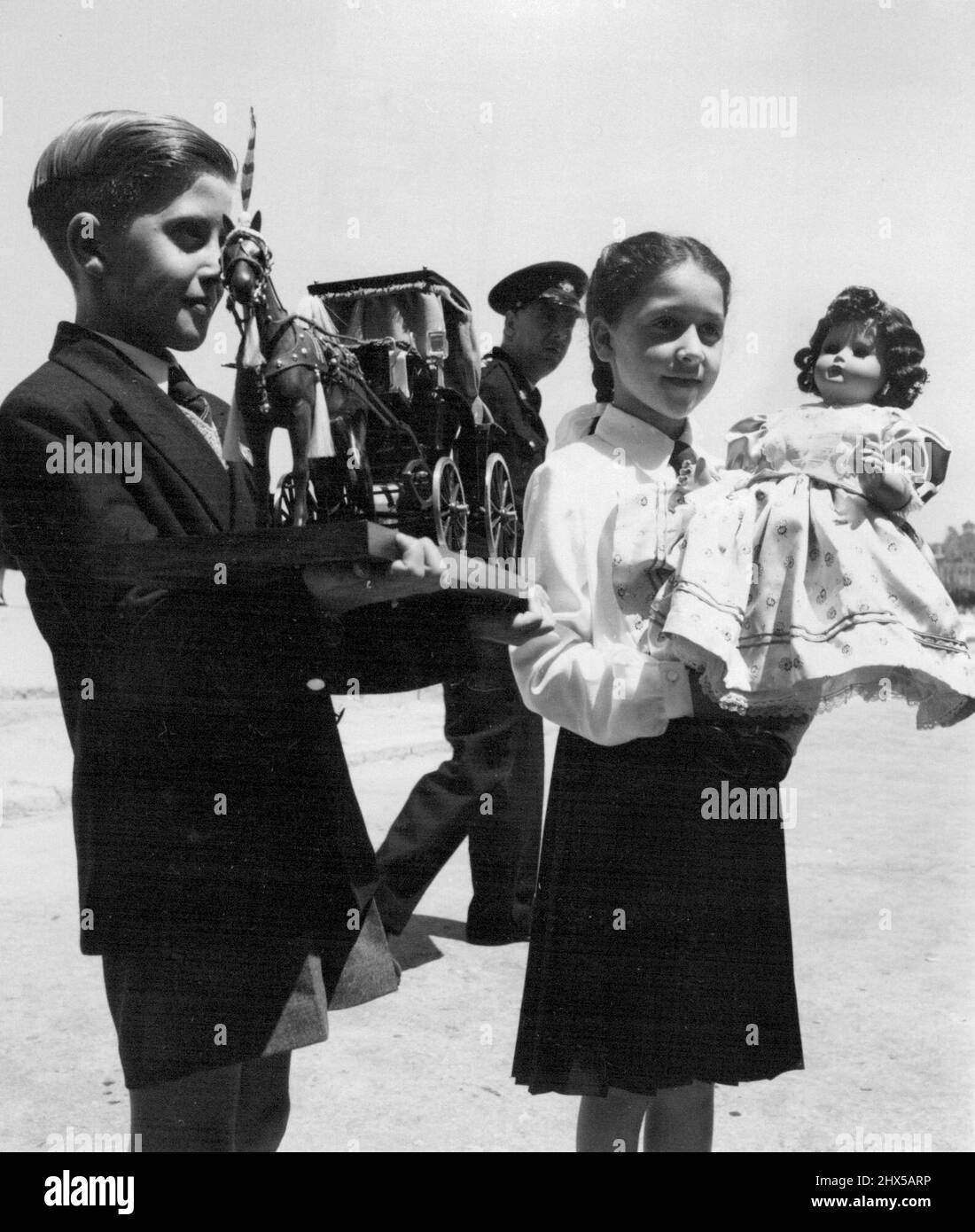 The Queen was presented with a model Maltese cab and horse for the Duke ...