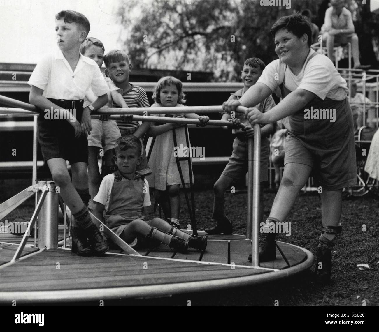 A revolving platform in the playground is very popular with the ...