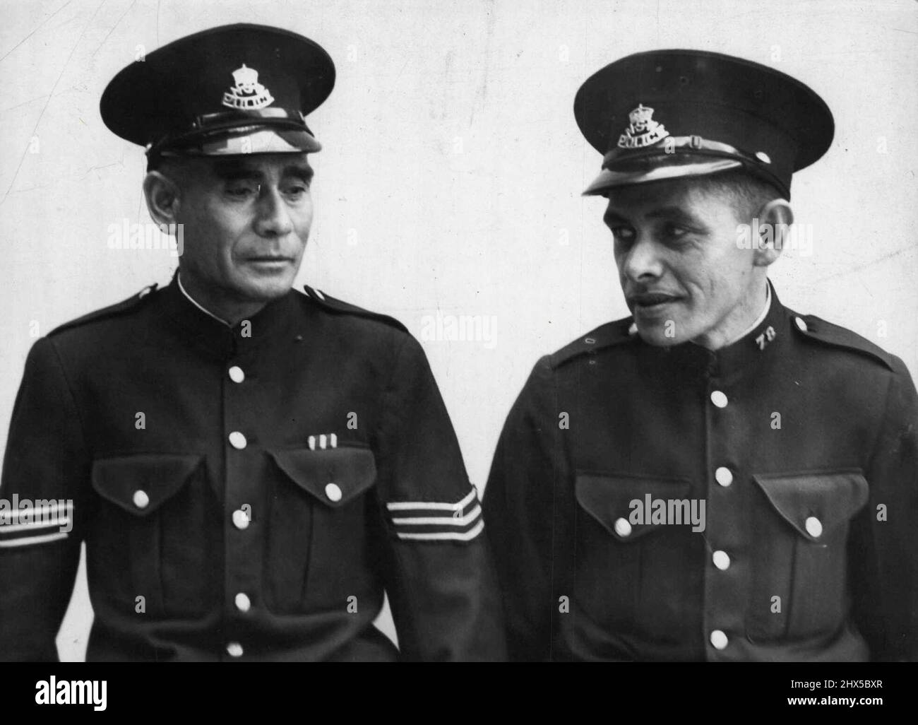 Black Tracker - Sgt. A. Riley, Con. L. Kim. August 13, 1945 Stock Photo ...