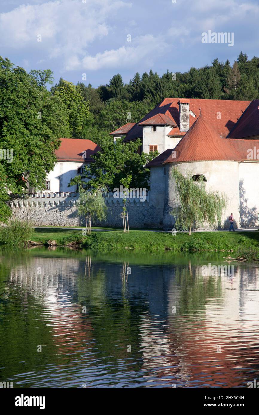 Slovenia, Lower Carniola, Otocec, castle across Krka river Stock Photo ...