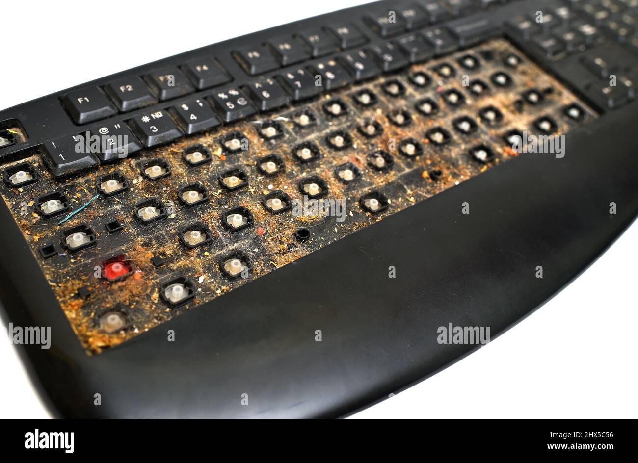 very dirty black disassembled keyboard close-up Stock Photo - Alamy