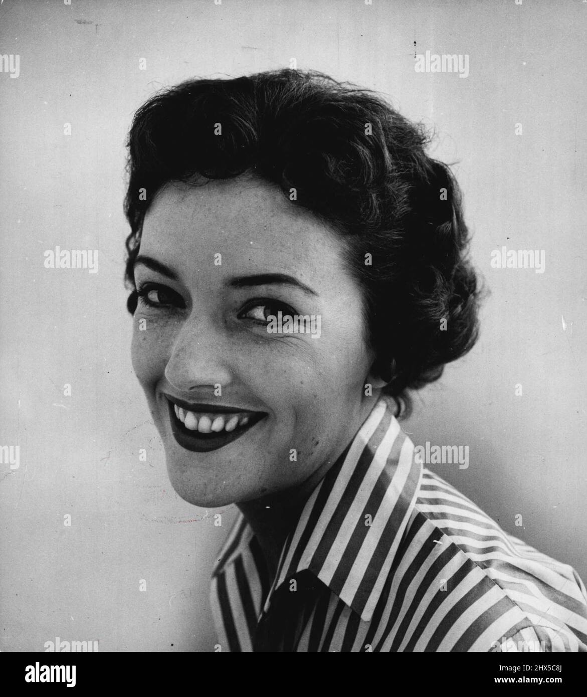 This trim, head-hugging style has a short line in front, dipping to ...