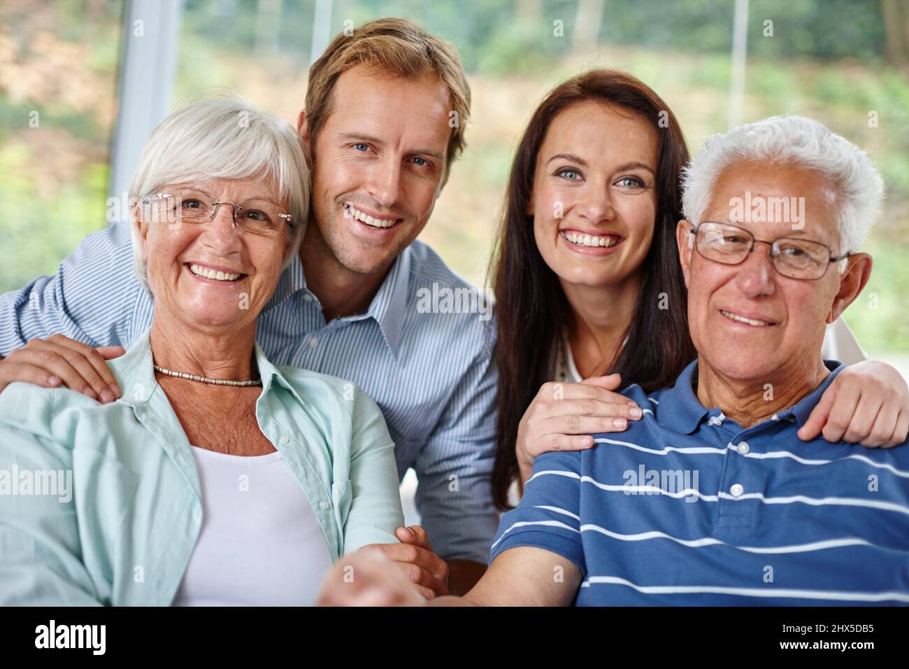 Family is like a small piece of Heaven. Portrait of a happy family of ...