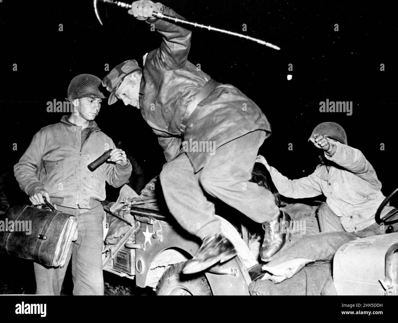 German Commander at Brest after Surrender stick in hand and followed by ...