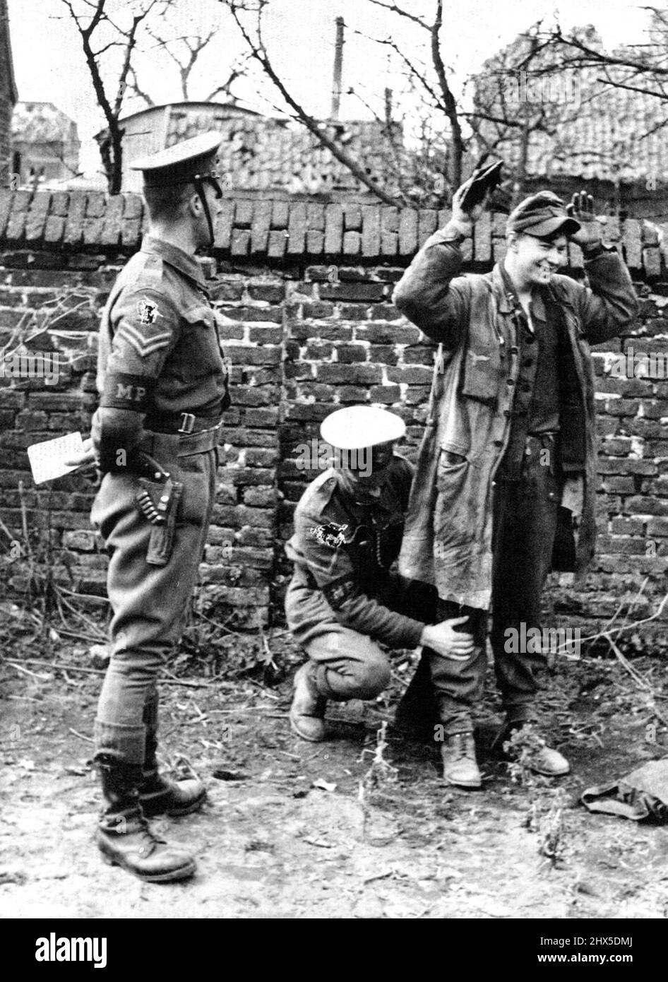 Check-Up : British Military police check up on a battle-happy hun ...
