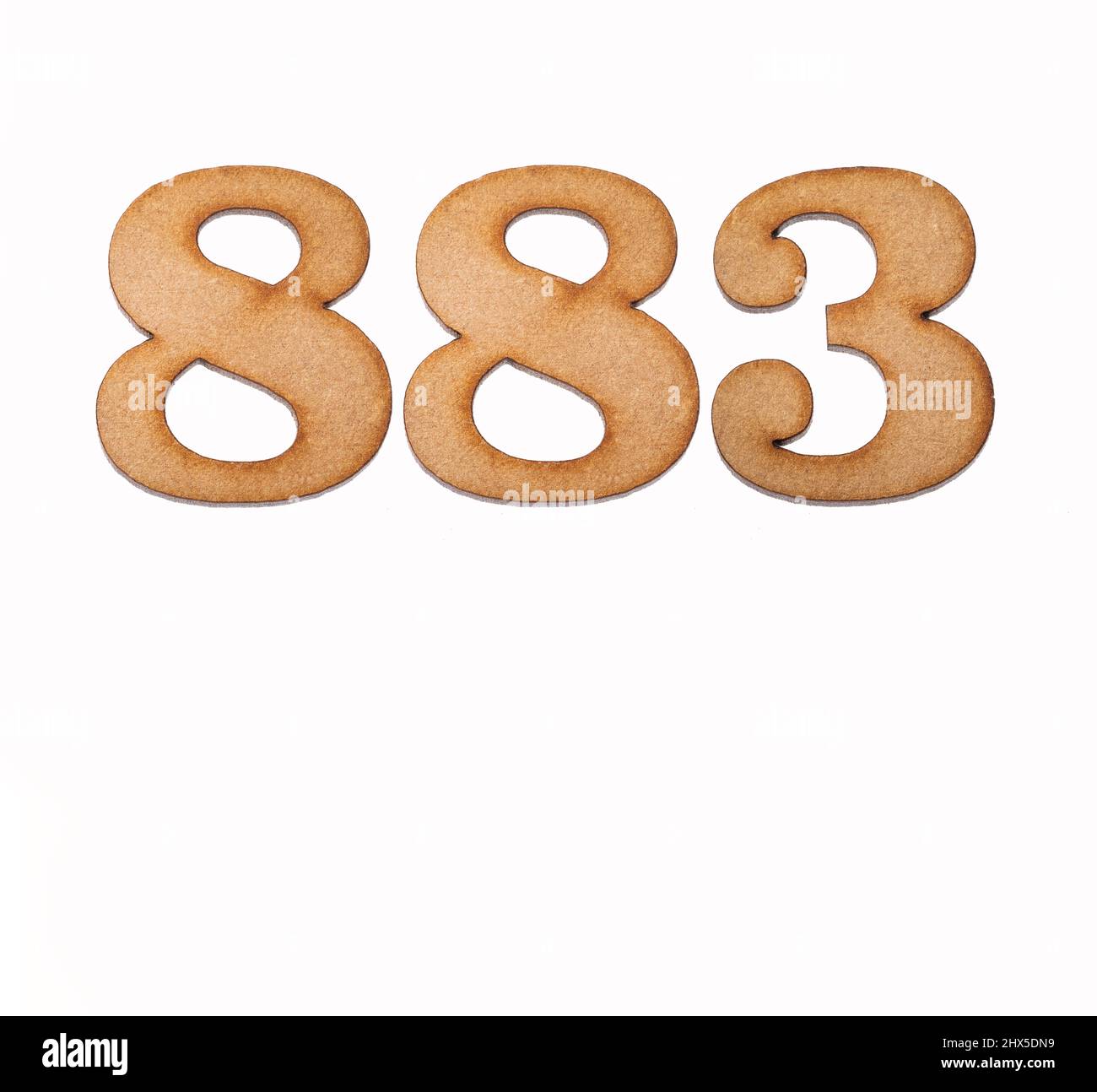 Number 883 in wood, isolated on white background Stock Photo - Alamy