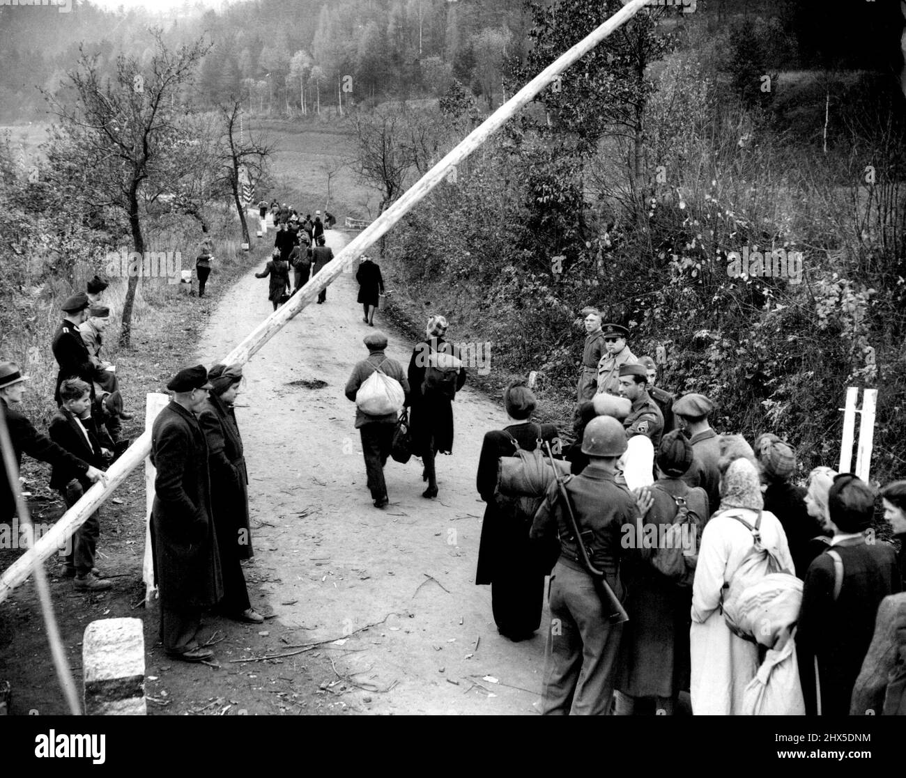 German Refugees Enter Russian Zone - With The Barrier Gate lifted, the ...