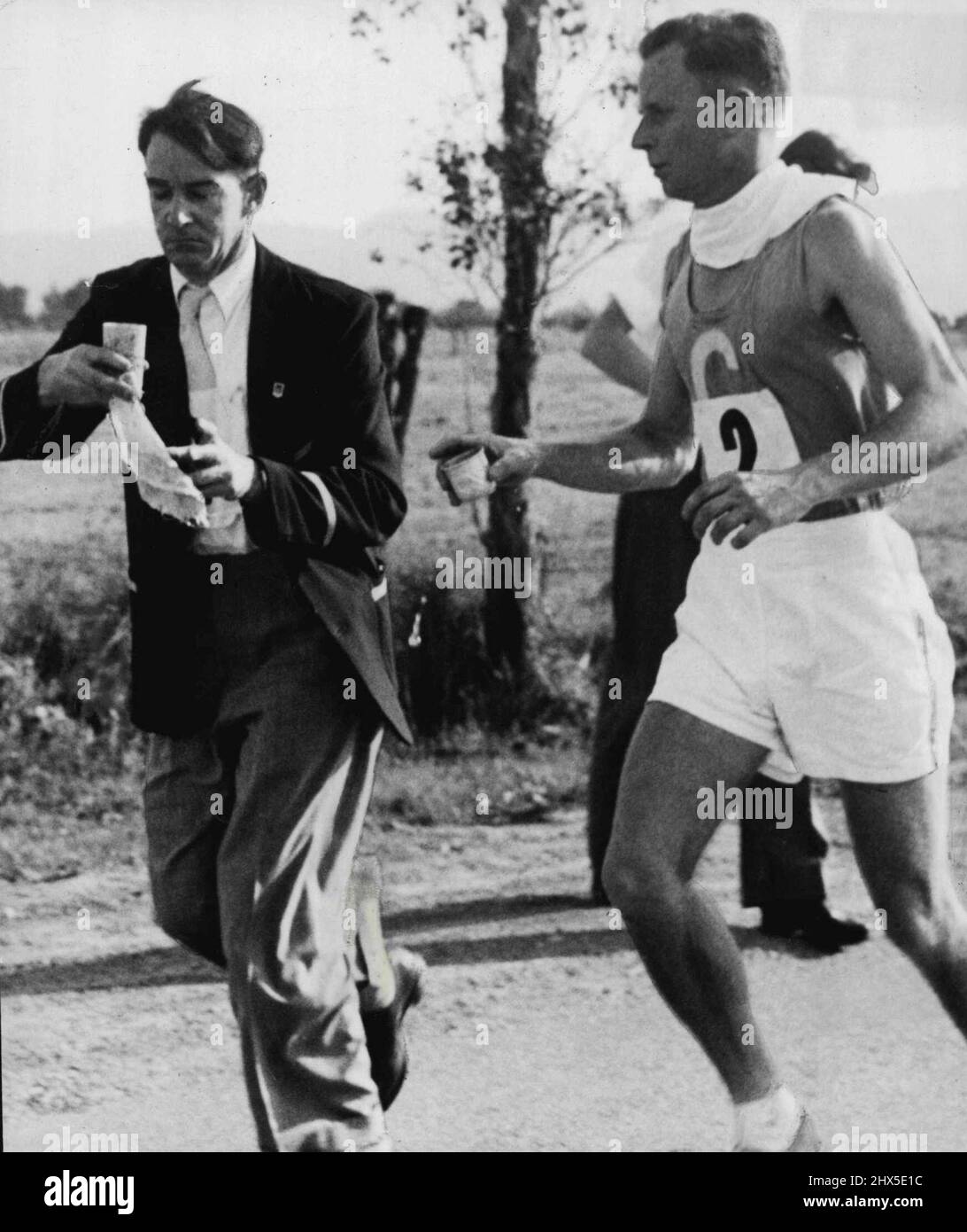 Marathon Championship of N.S.W. R.Prentice of Victoria receive in water ...