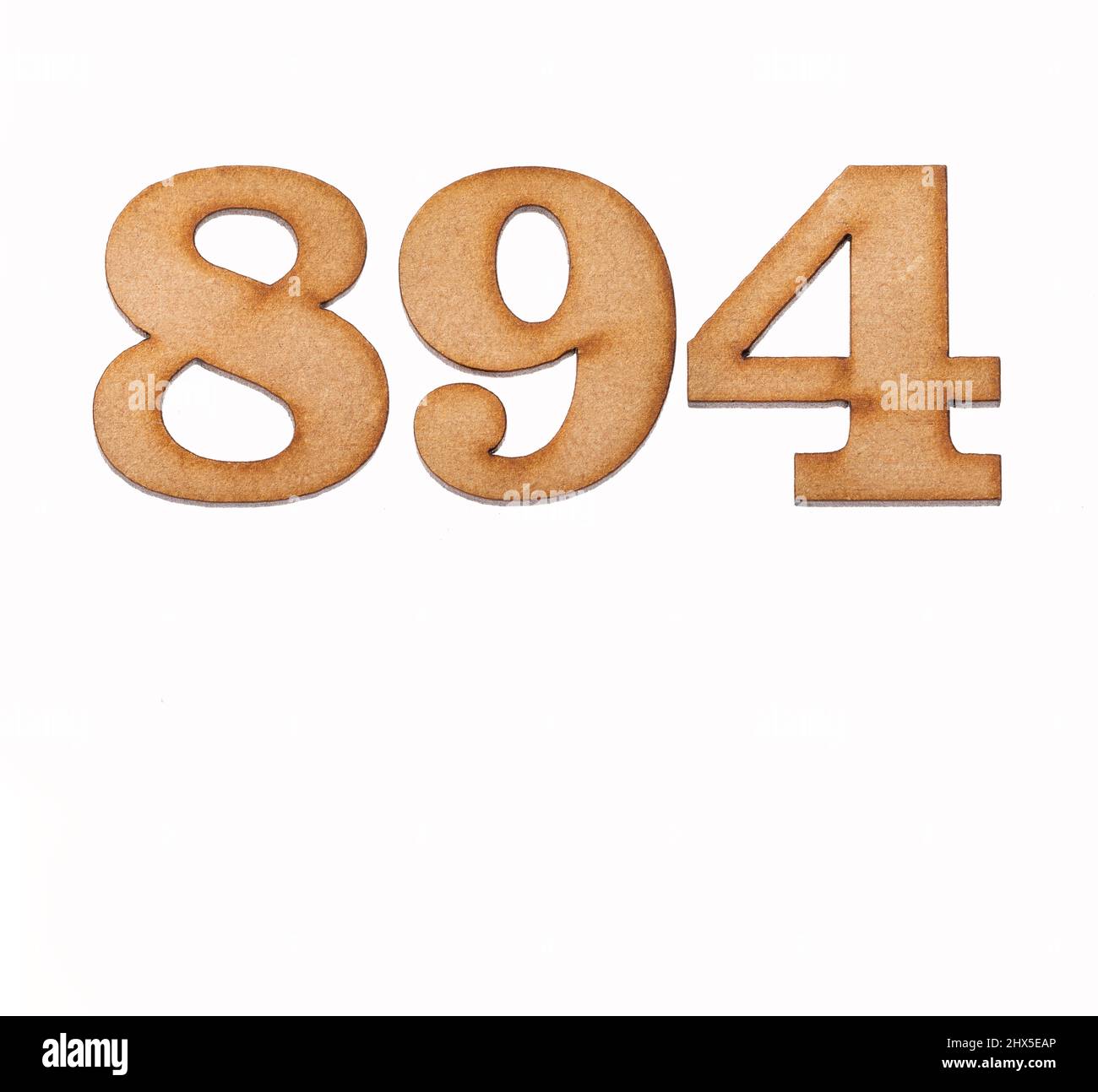 Number 894 - Piece of wood isolated on white background Stock Photo - Alamy