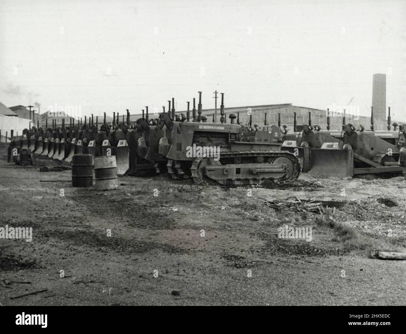 Bulldoezers. Port of a million pound fleet, rusting in a paddock for ...