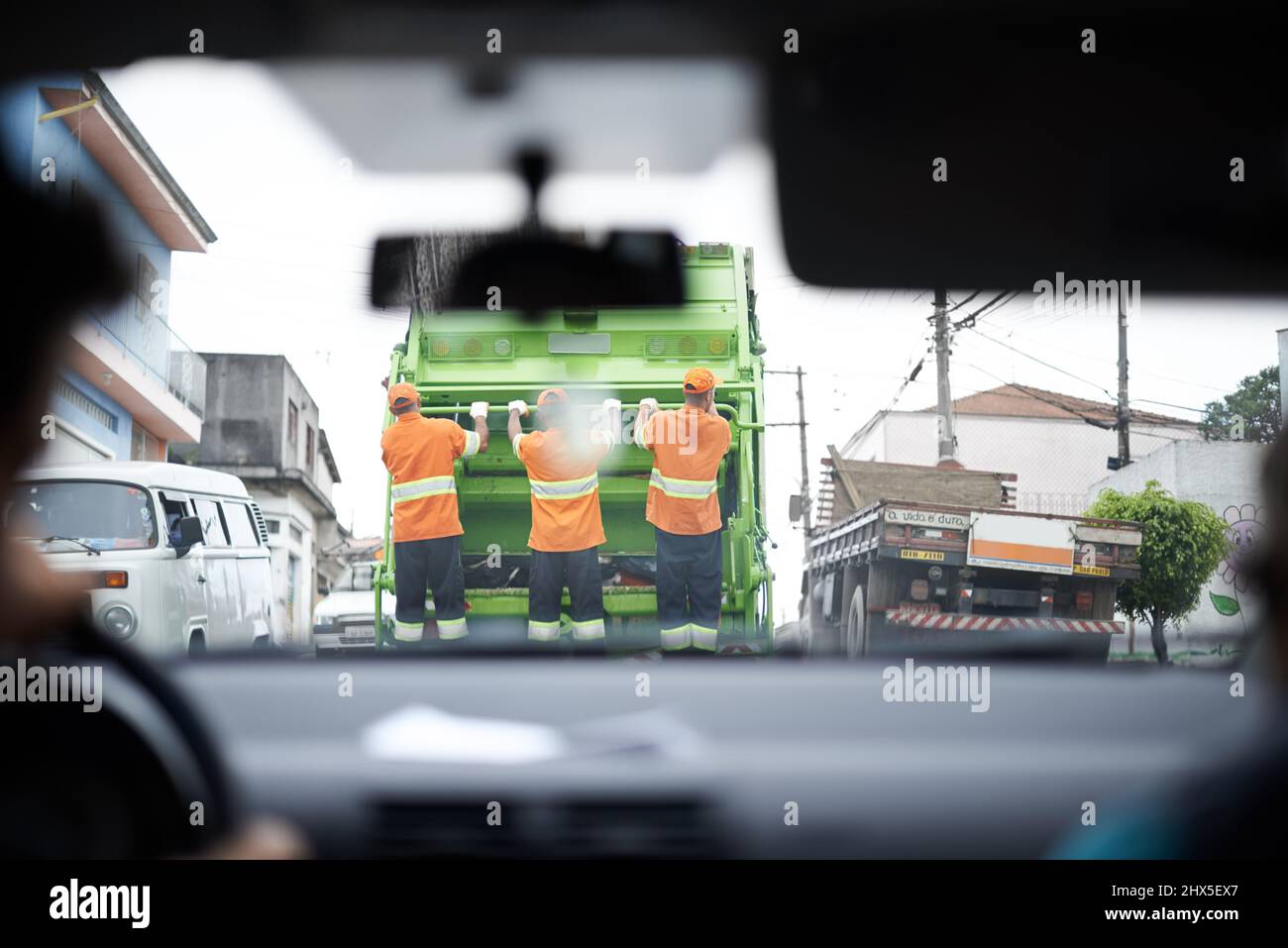 Garbage collection day. Cropped rear view shot of a garbage collection ...