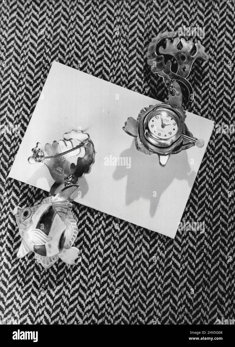 Two views of a novelty lapel-watch displayed at the 25th annual Swiss ...