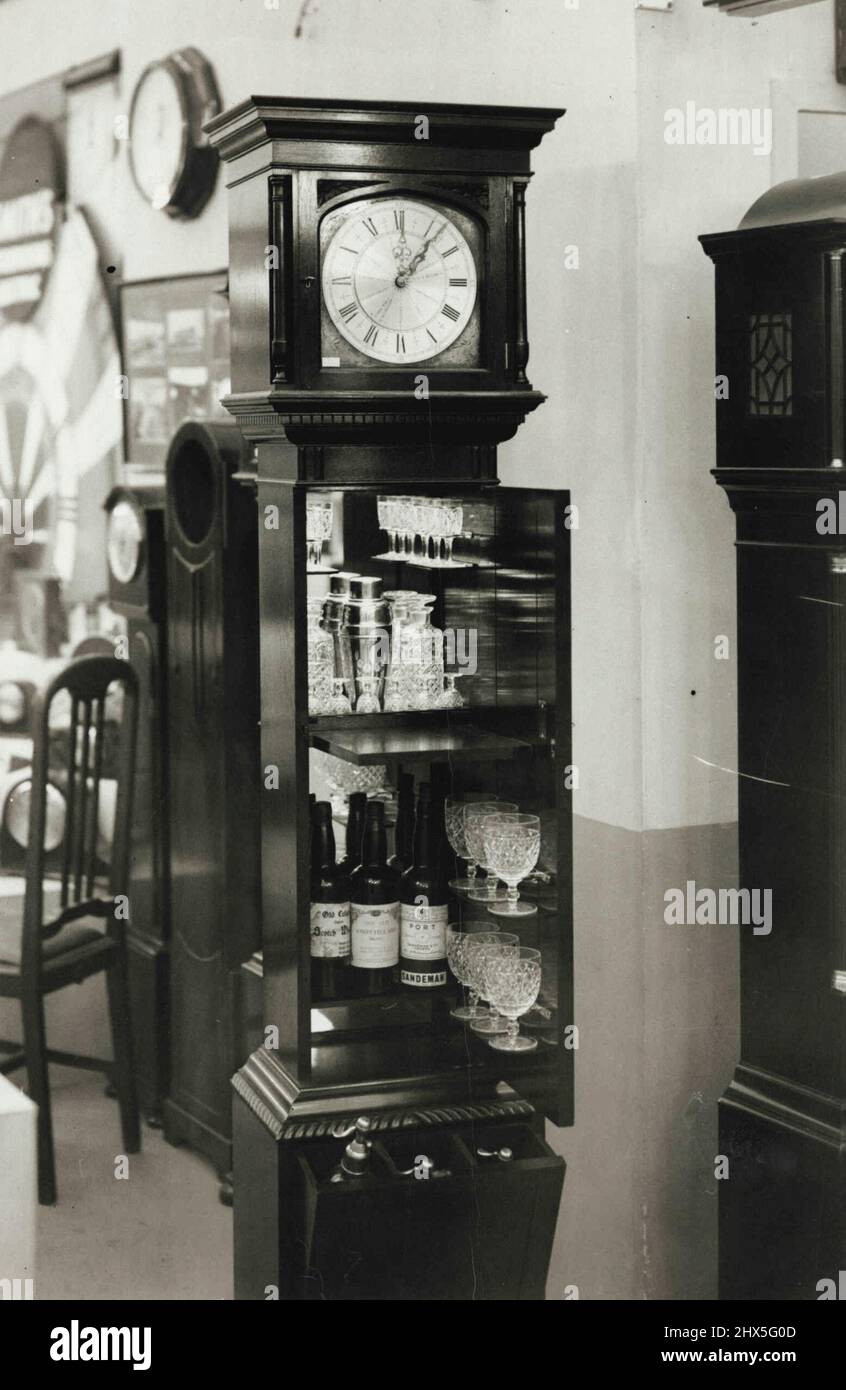 "A Wet Clock" For America. Our picture shows a grandfather clock with ...